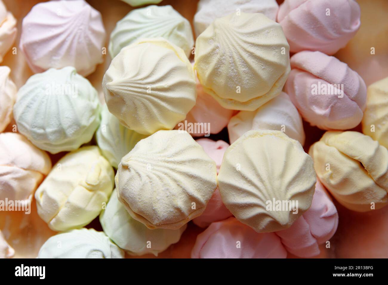 Marshmallow production. Fresh, sweet, multi-coloured marshmallows just ...