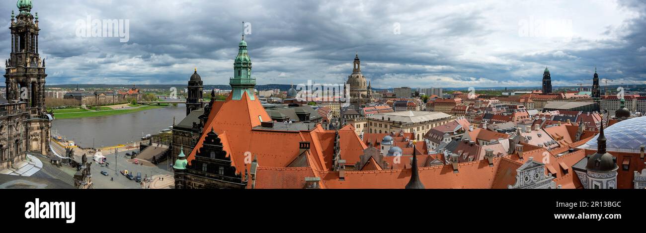 panoramic view across the roofs of the old town with the towers of the ...
