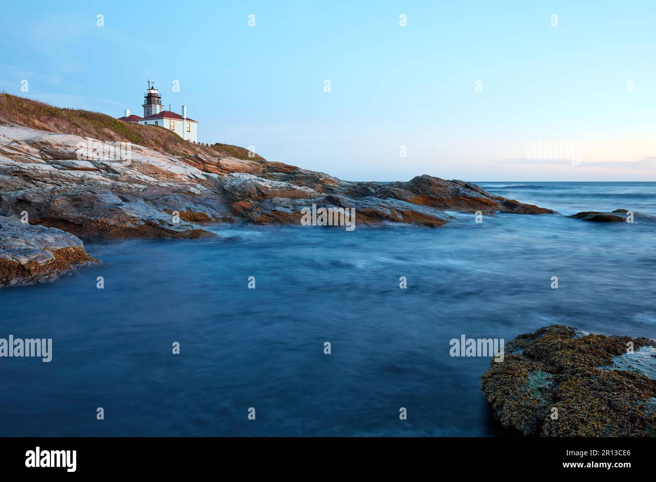 Beavertail Lighthouse cliffs before sunset Stock Photo - Alamy