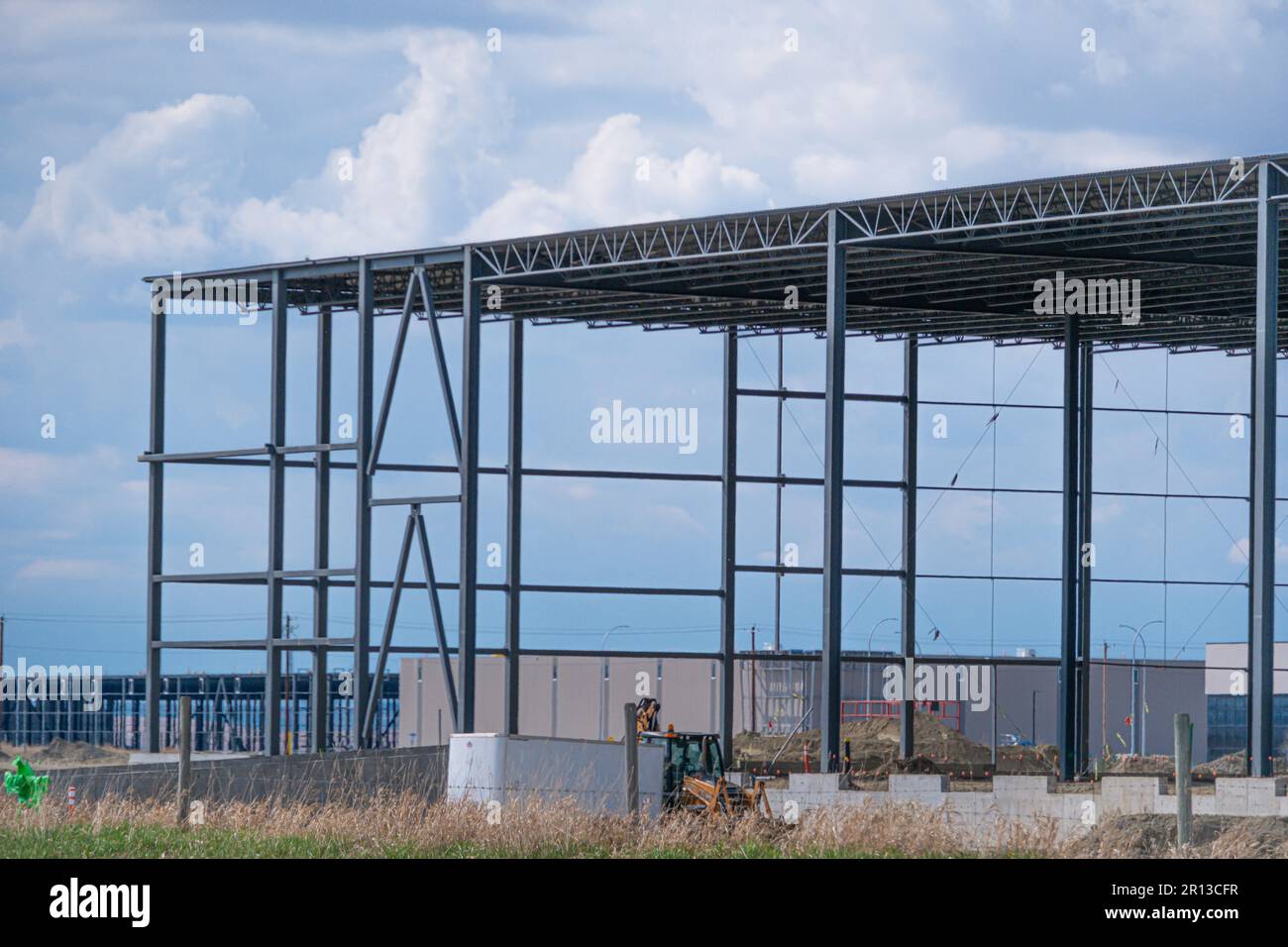 New commercial warehouse building under construction Stock Photo - Alamy