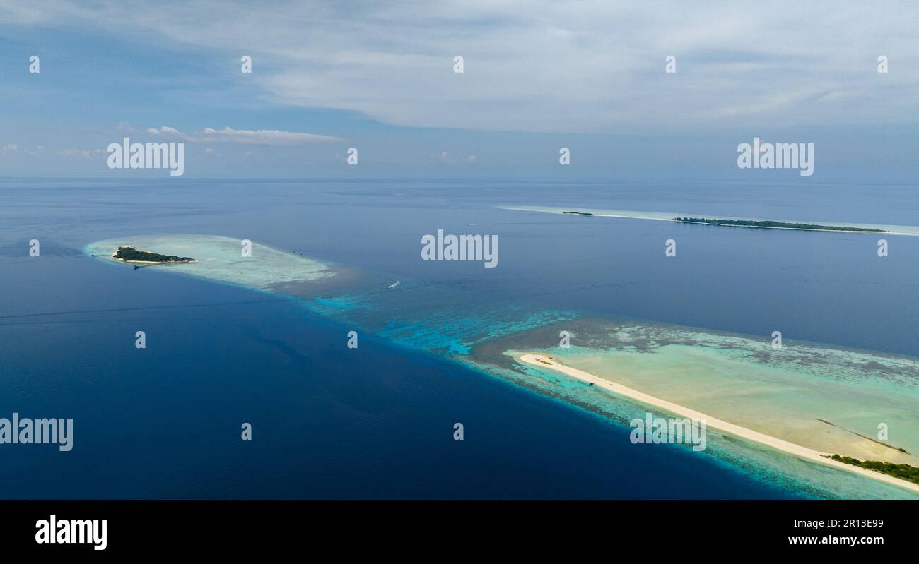 Top view of tropical islands on the atoll and coral reef. Timba Timba ...