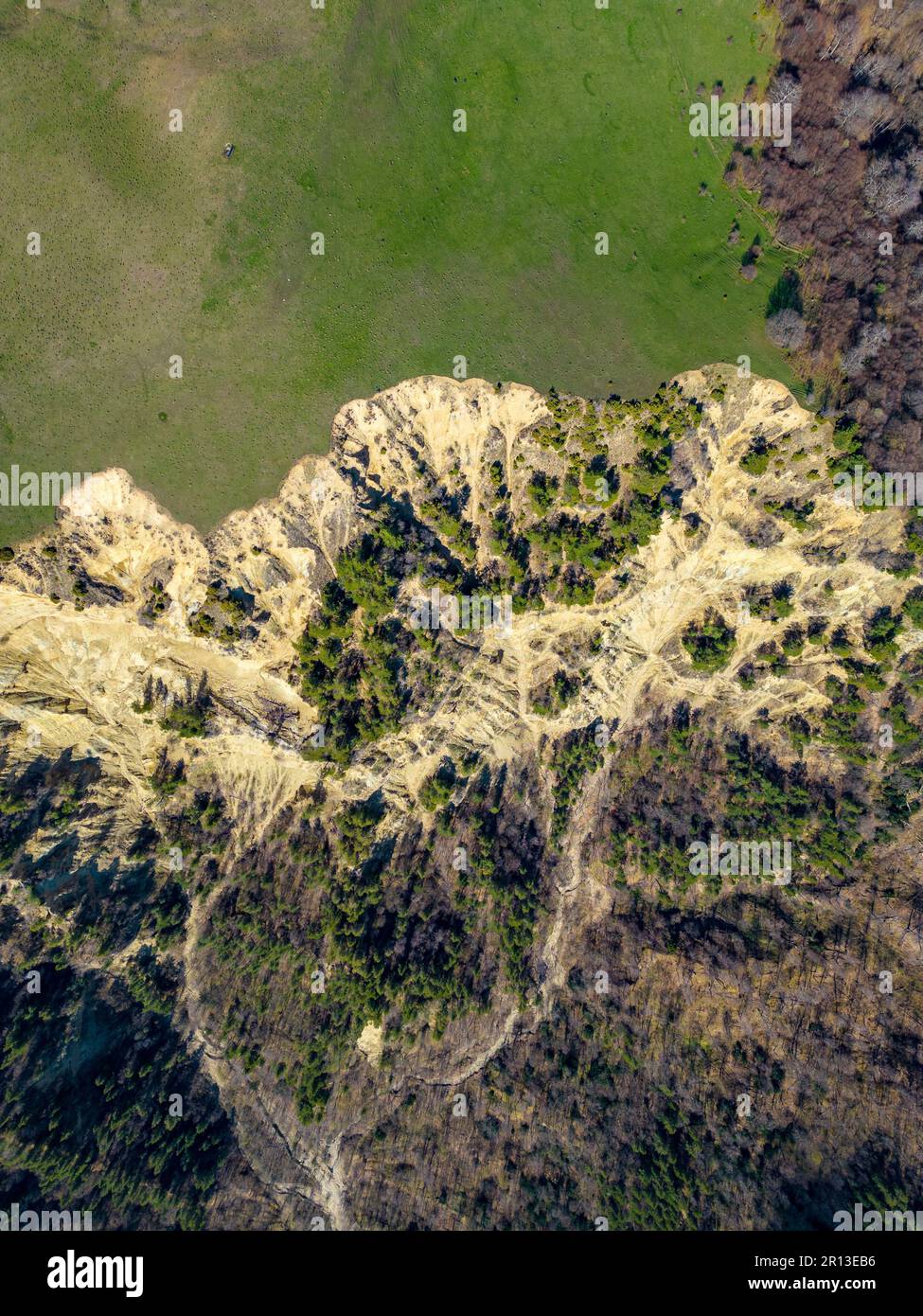 An aerial view of the green valley with rugged cliffs. Georgia Stock ...