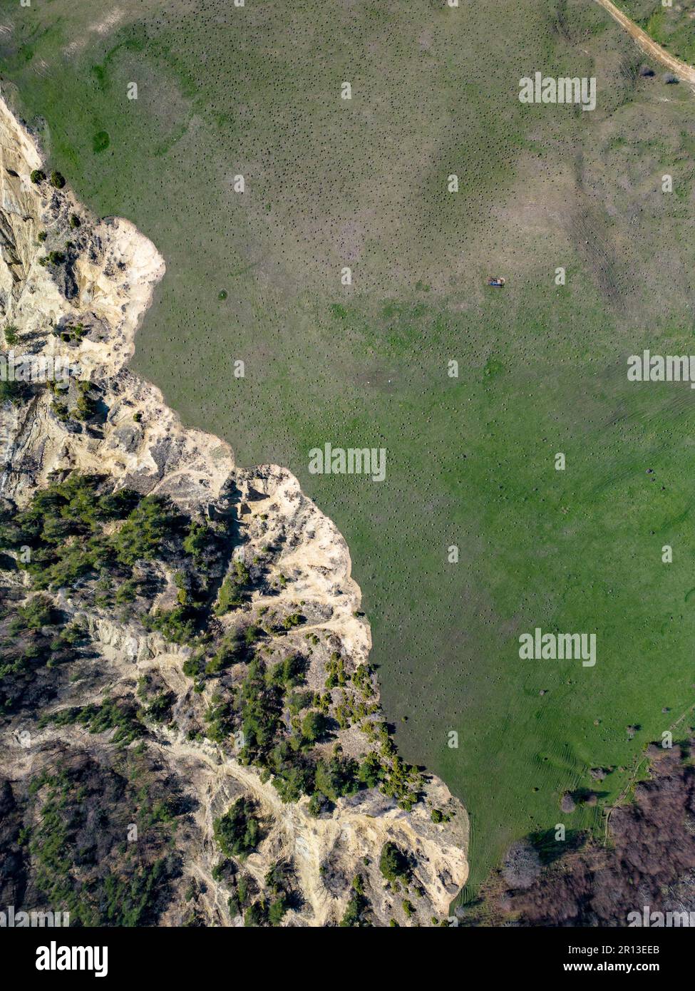 An aerial view of the green valley with rugged cliffs. Georgia Stock ...