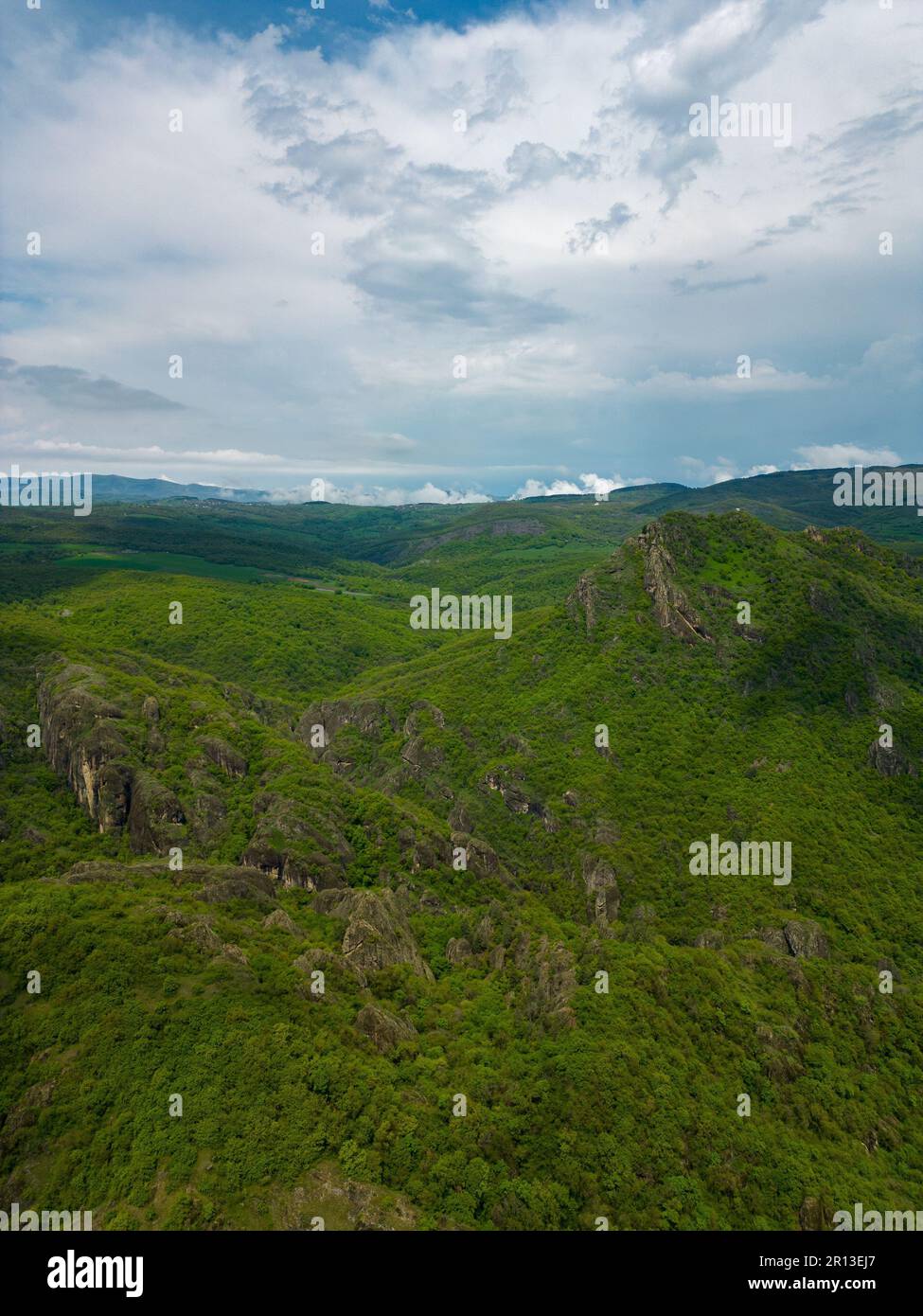 An aerial view of the beautiful mountains of Georgia covered with lush ...