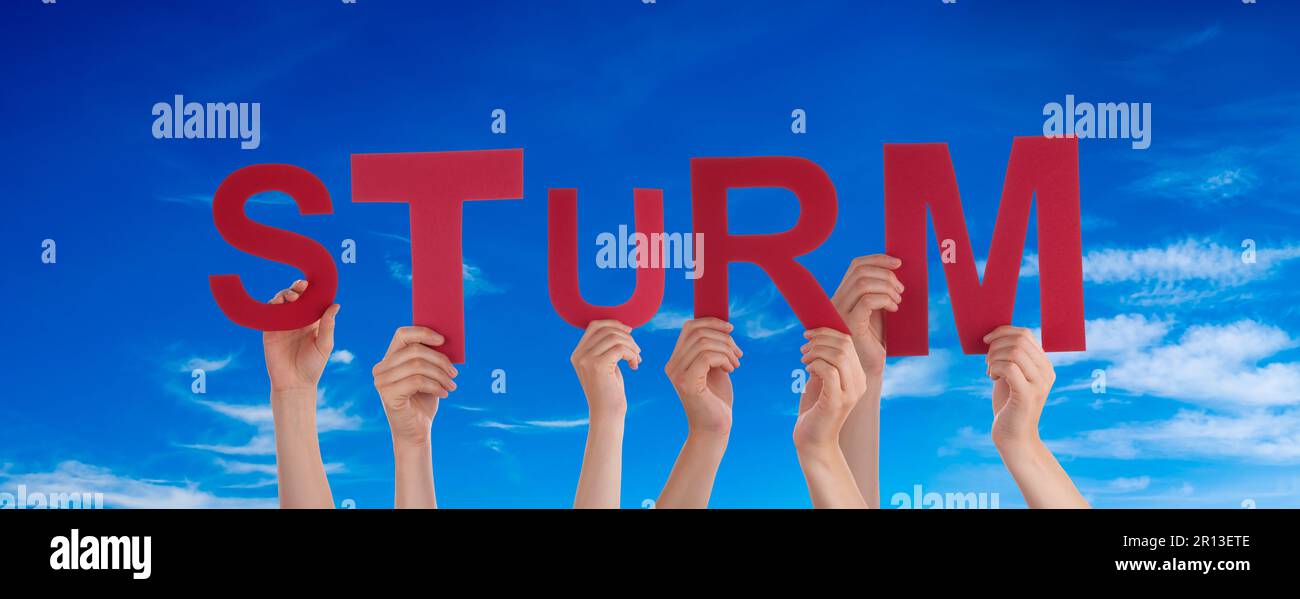 People Hands Building Word Sturm Means Storm, Blue Sky Stock Photo - Alamy