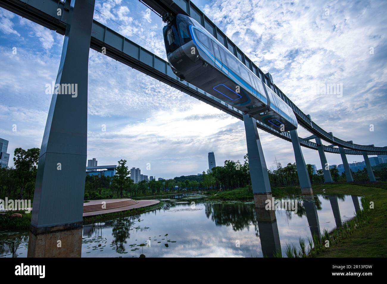 Wuhan, China. 9th May, 2023. This photo taken on May 9, 2023 shows a train running on the ...