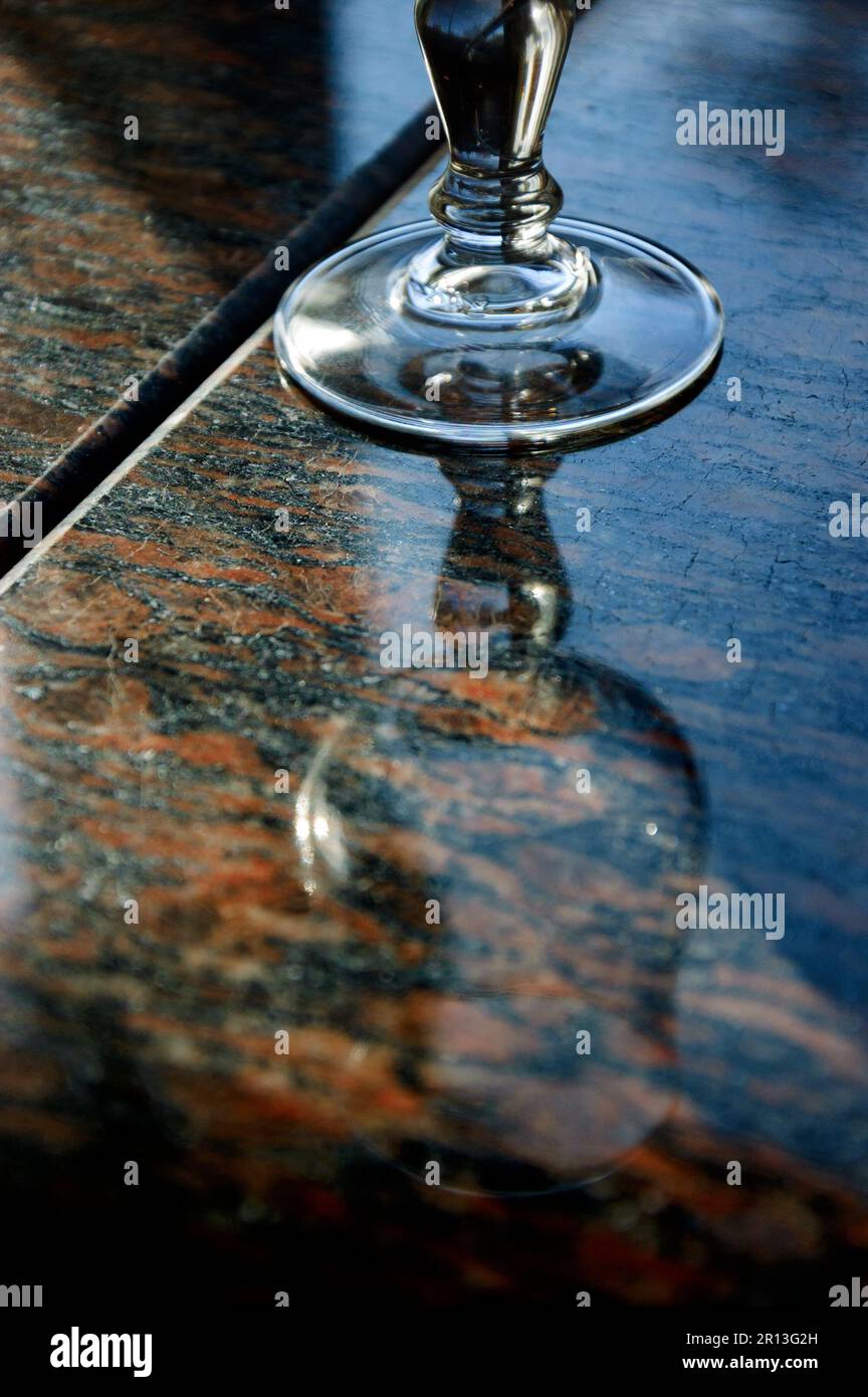 Reflection of empty glass in marble table. Stop drinking, sobriety ...