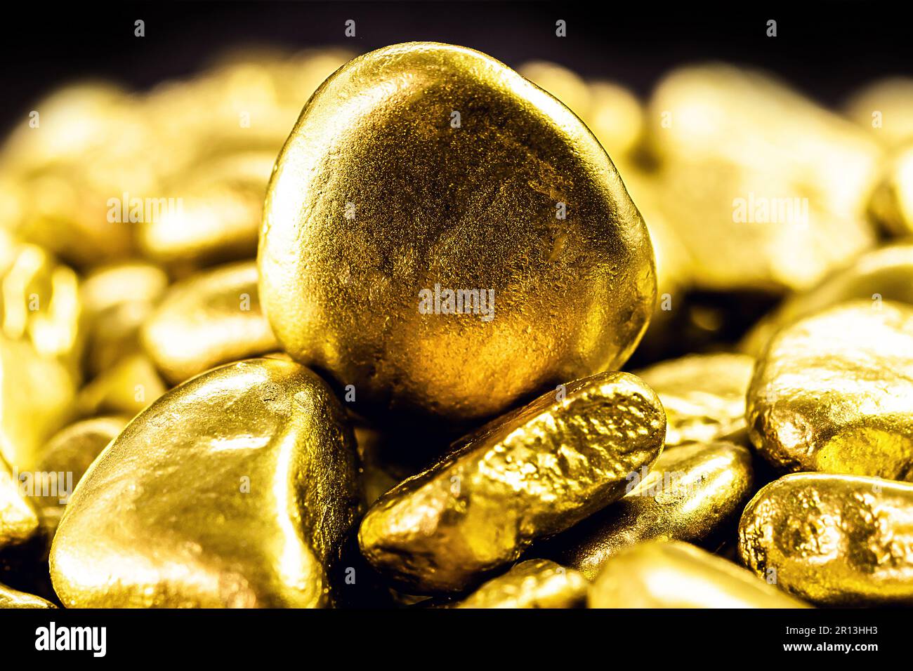 gold on isolated black background, gold stones, rare stones mining ...