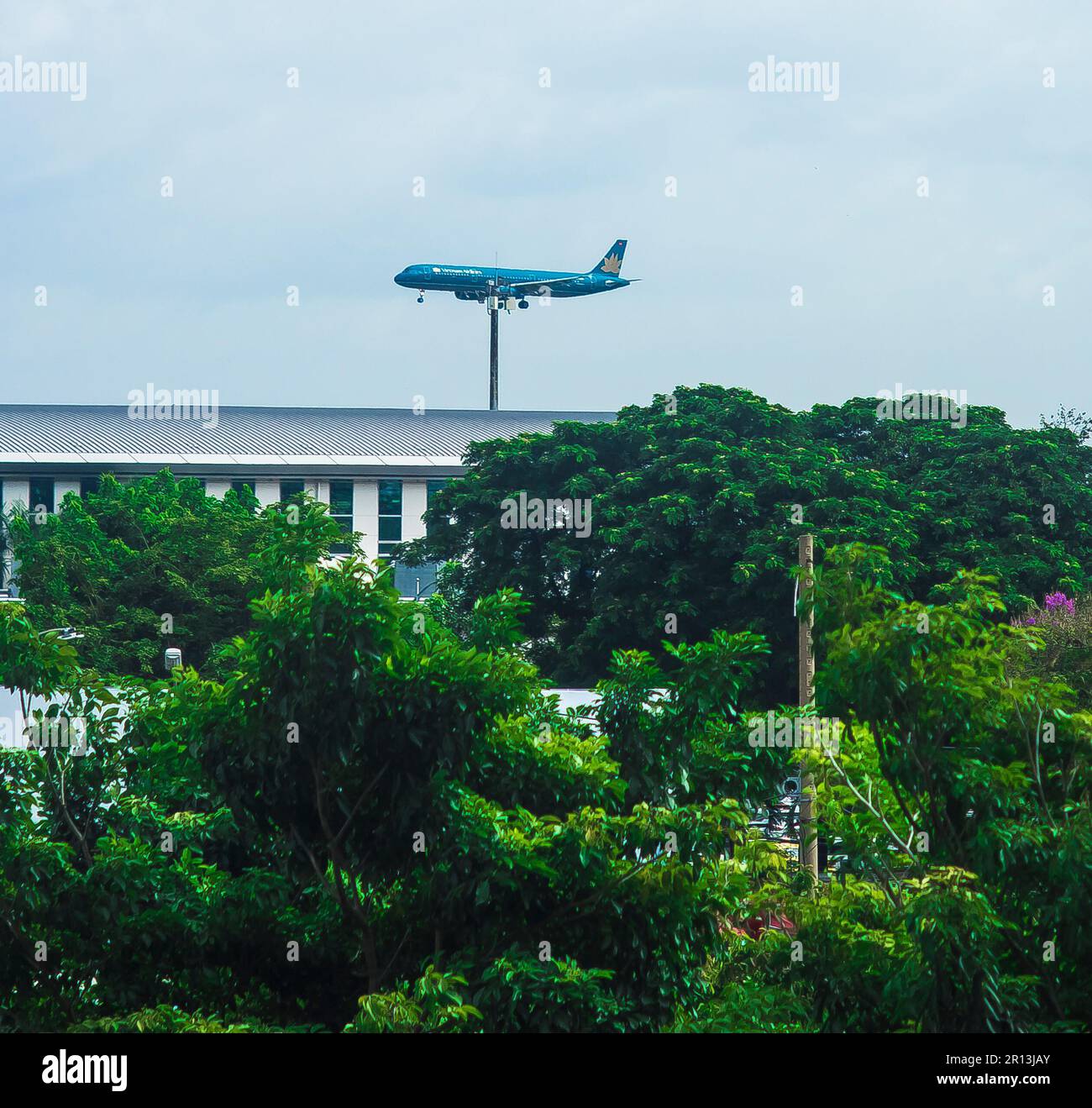 the plane fly on the sky of vietnam Stock Photo - Alamy