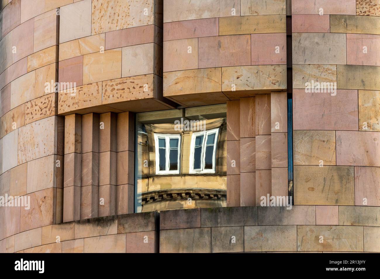 A reflection of a window in a window on the outside of the National ...