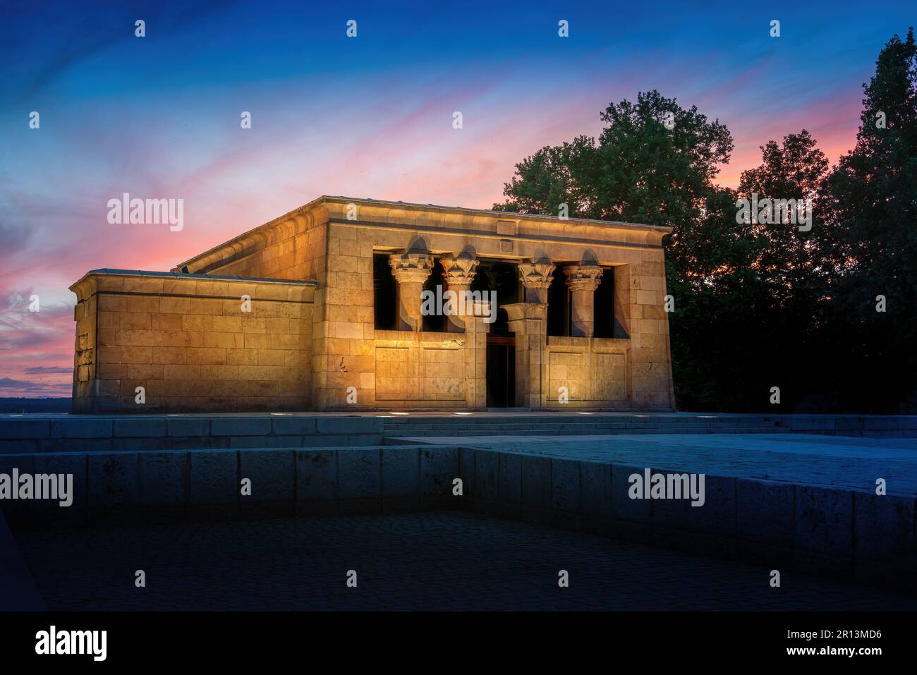 Illuminated Temple of Debod at sunset - ancient Egyptian temple at La ...