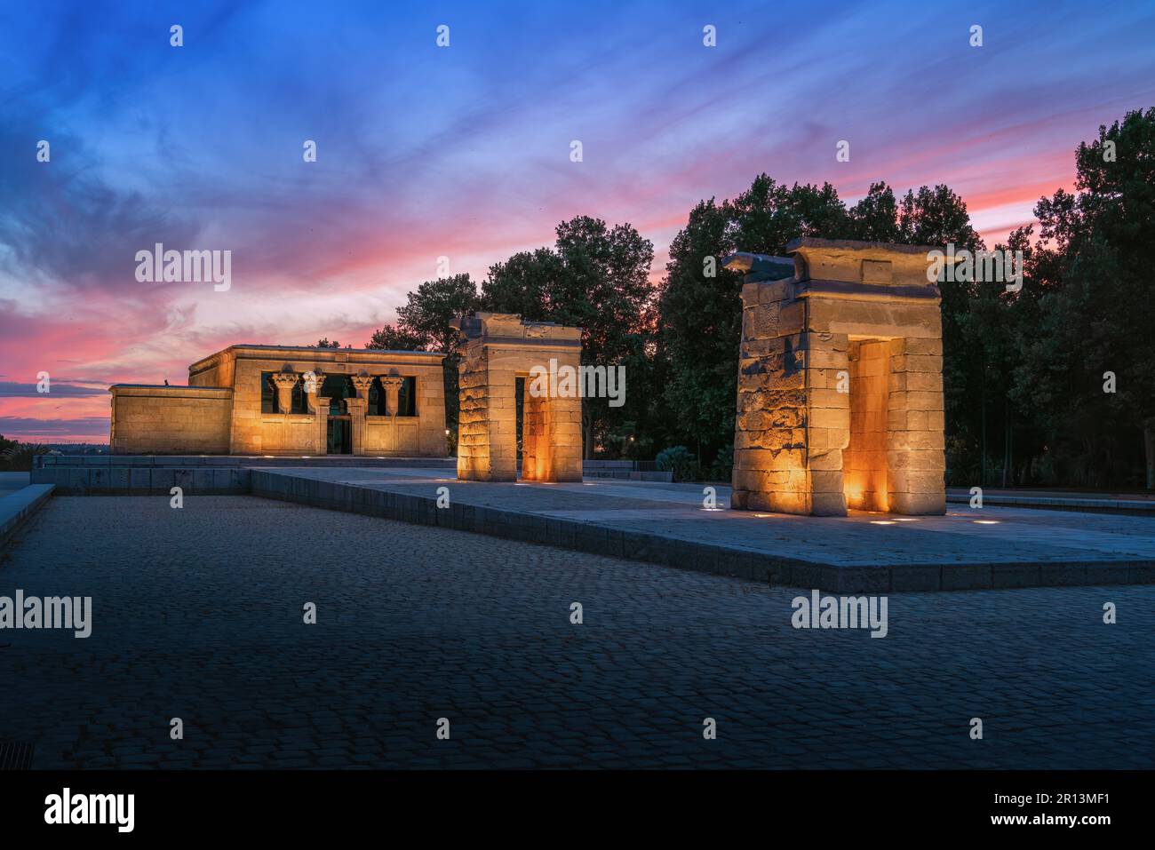Illuminated Temple of Debod at sunset - ancient Egyptian temple at La ...