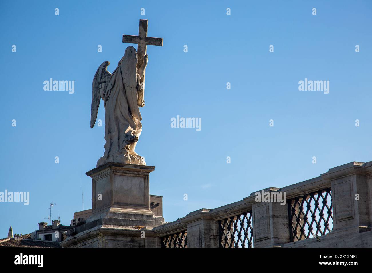 Statues an angel on a bridge with a cross on top. Rome, Italy Stock ...