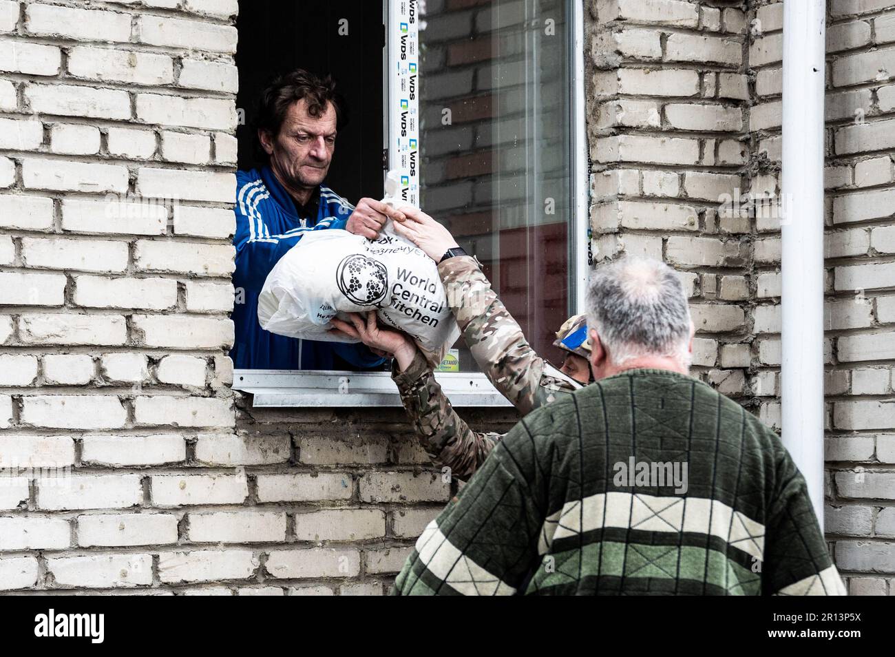 Food being distributed in a small village in the Donbas area of Ukraine ...