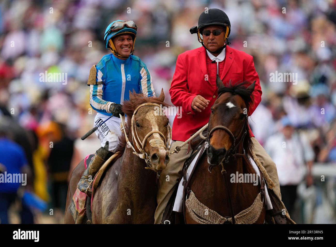 Javier Castellano, atop Mage, celebrates after winning the 149th ...