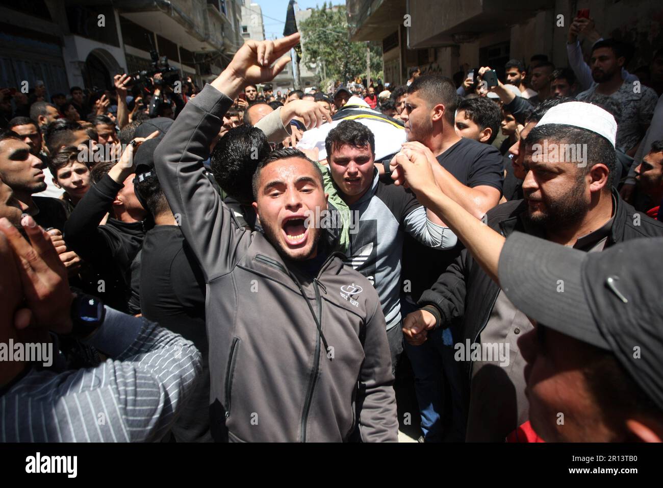 Palestinian mourners attend the funeral of Islamic Jihad commander Ali ...