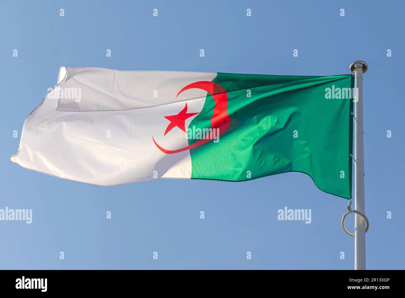 National Flag of Algeria Country Sunny Day Blue Sky Stock Photo - Alamy