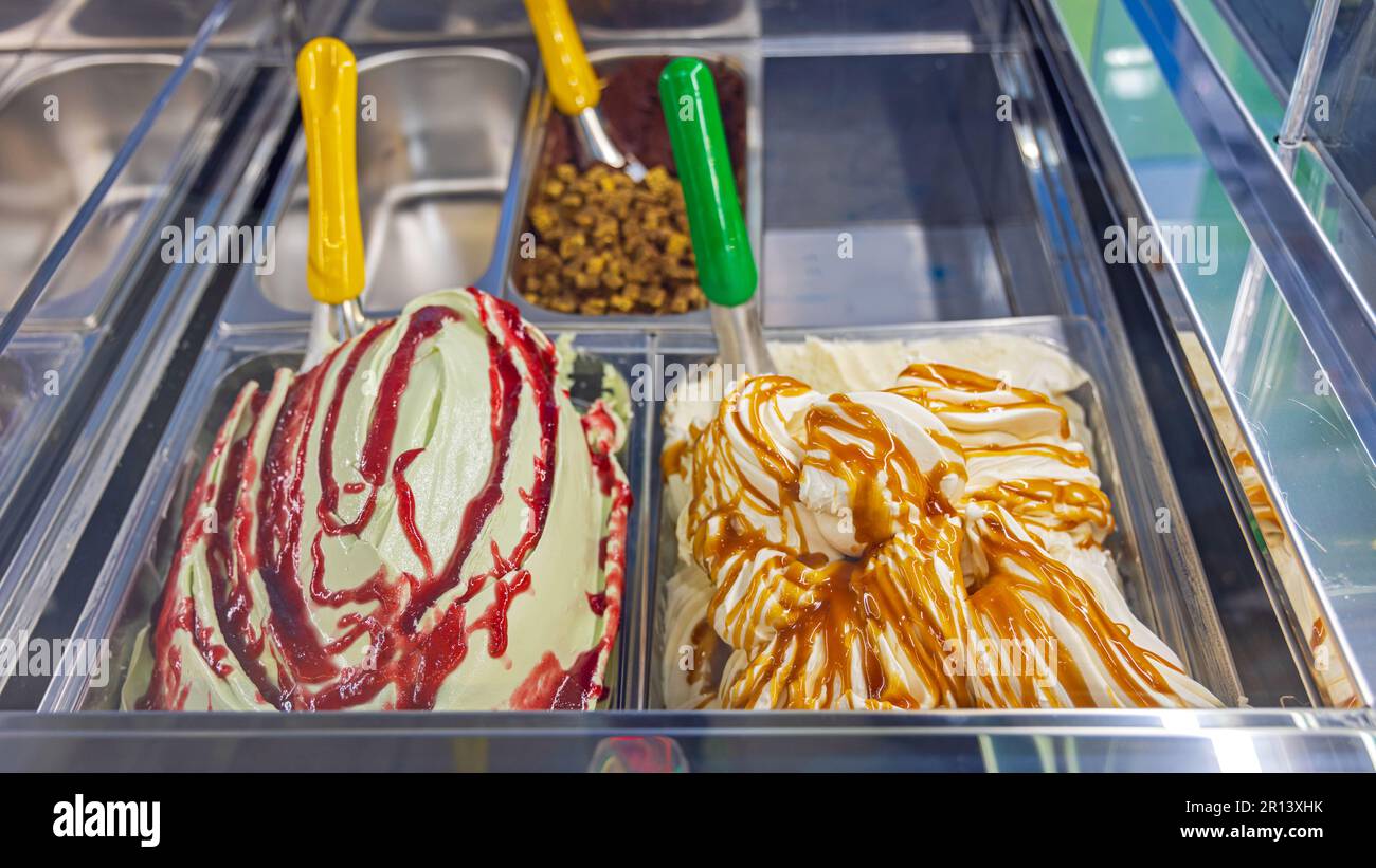 Ice Cream in Trays at Display Fridge Cabinet Stock Photo - Alamy