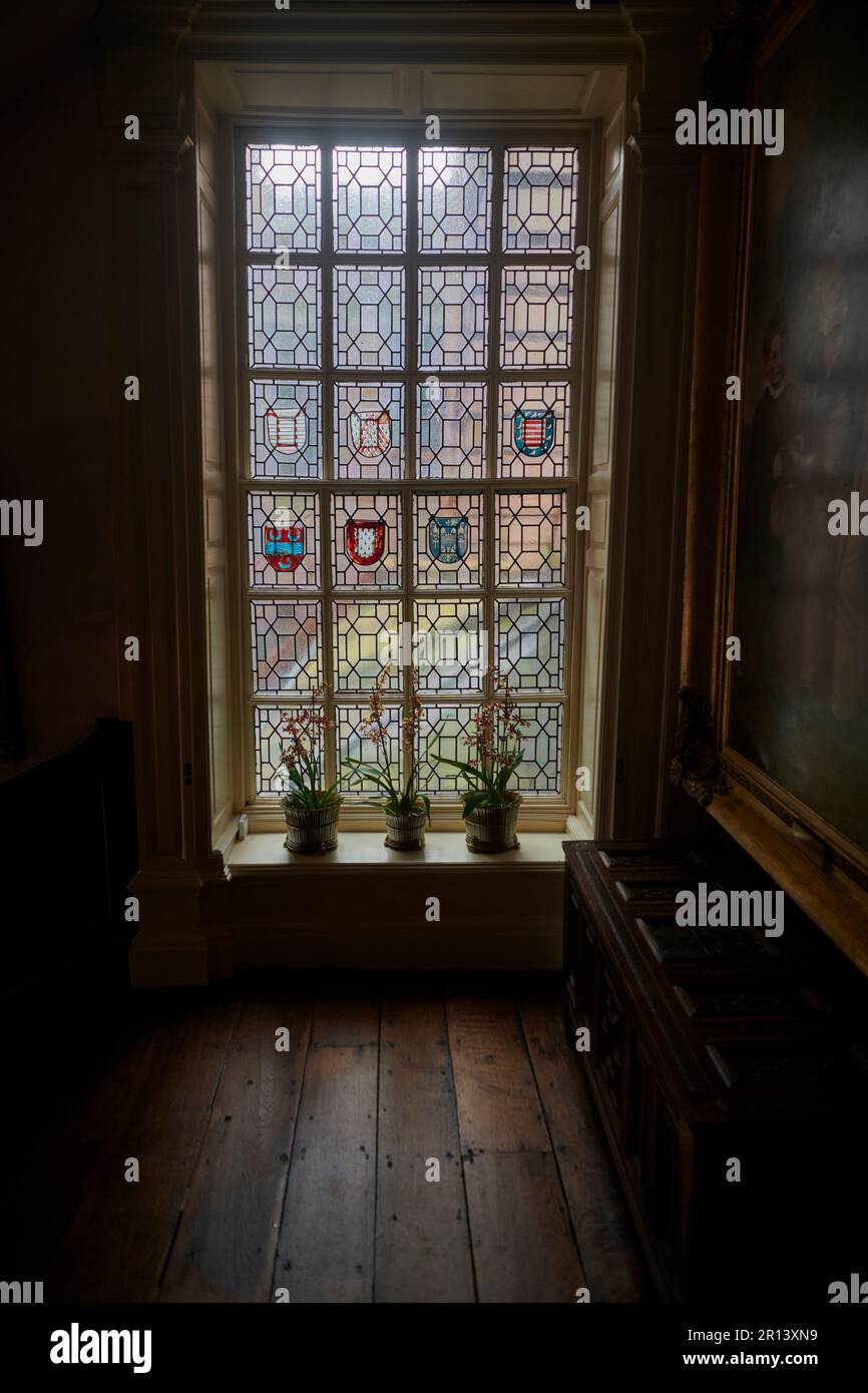 A stained glass window with the Armorials of Roger de Stuteville et al ...