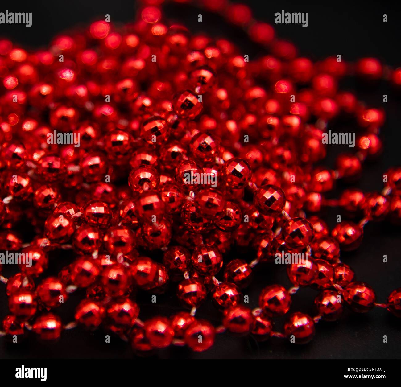 Small red, Christmas, Xmas festive balls on black background. Desktop ...
