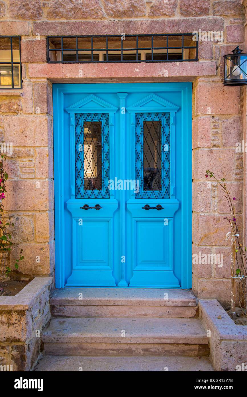 Blue double wooden door, well painted with windows. Architecture and ...