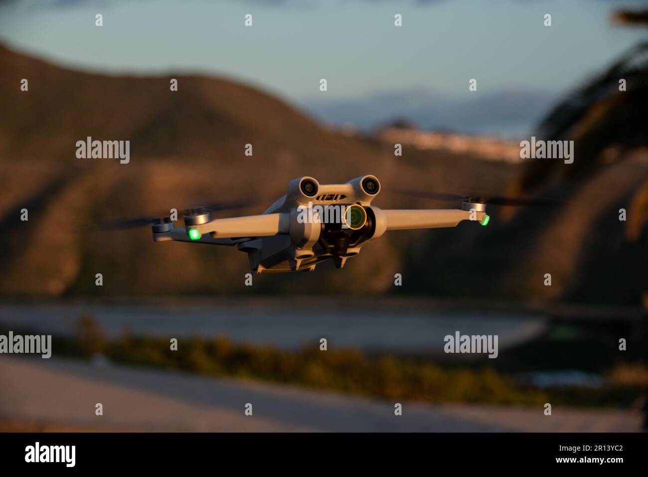 Close up of an African American man's hands controlling his UAS drone ...