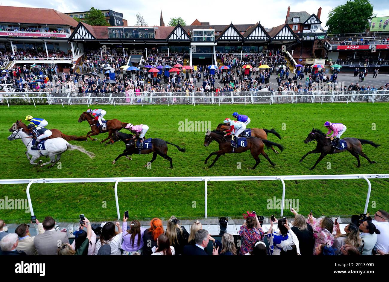 Runners and riders in action as they compete in the Halliwell Jones ...