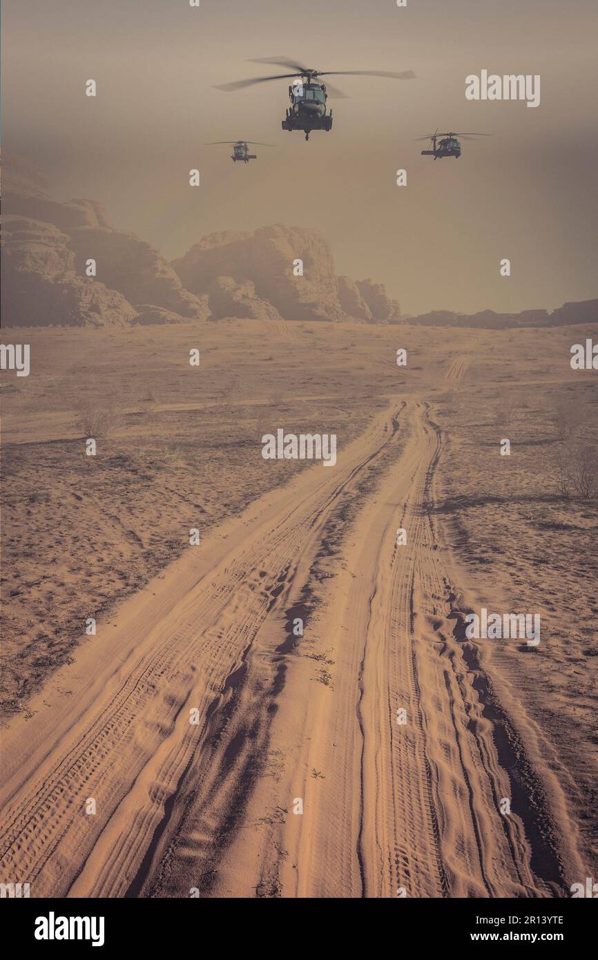 Military helicopters fly over the desert Stock Photo - Alamy