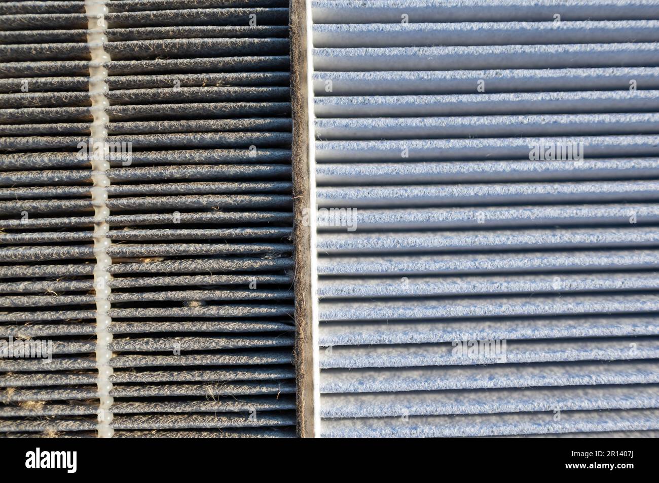 Side-by-side comparison of a dirty and clean automotive cabin filter ...