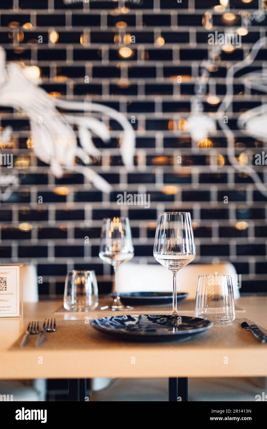 A warm and inviting restaurant interior featuring a stylishly decorated ...