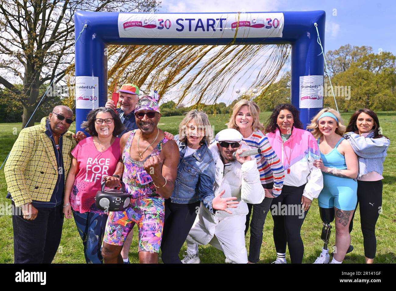 Chantelle Cox, 25, (second right) during a Cancer Research UK's Race ...