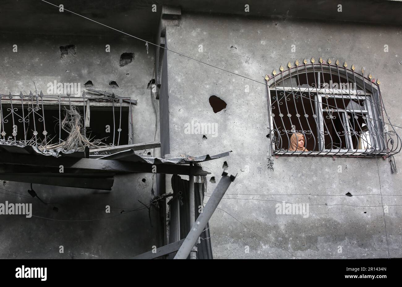 Gaza, Gaza Strip. 11th May, 2023. A Palestinian woman from the Al-Masri ...