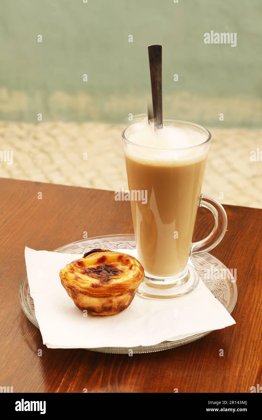 A Pastel de Nata and Coffee, Portuguese Custard Tarts Stock Photo - Alamy
