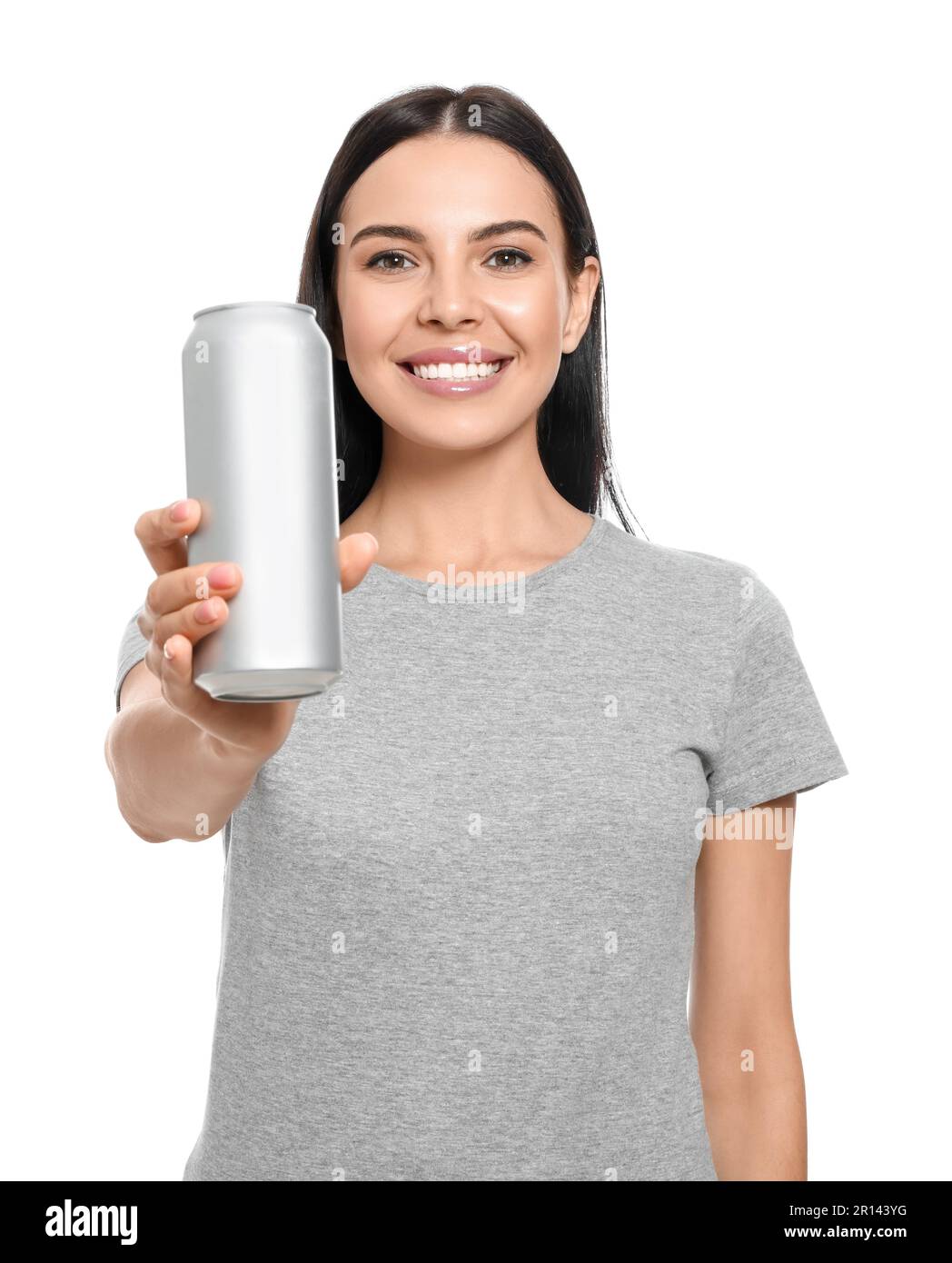 Beautiful happy woman holding beverage can on white background Stock ...