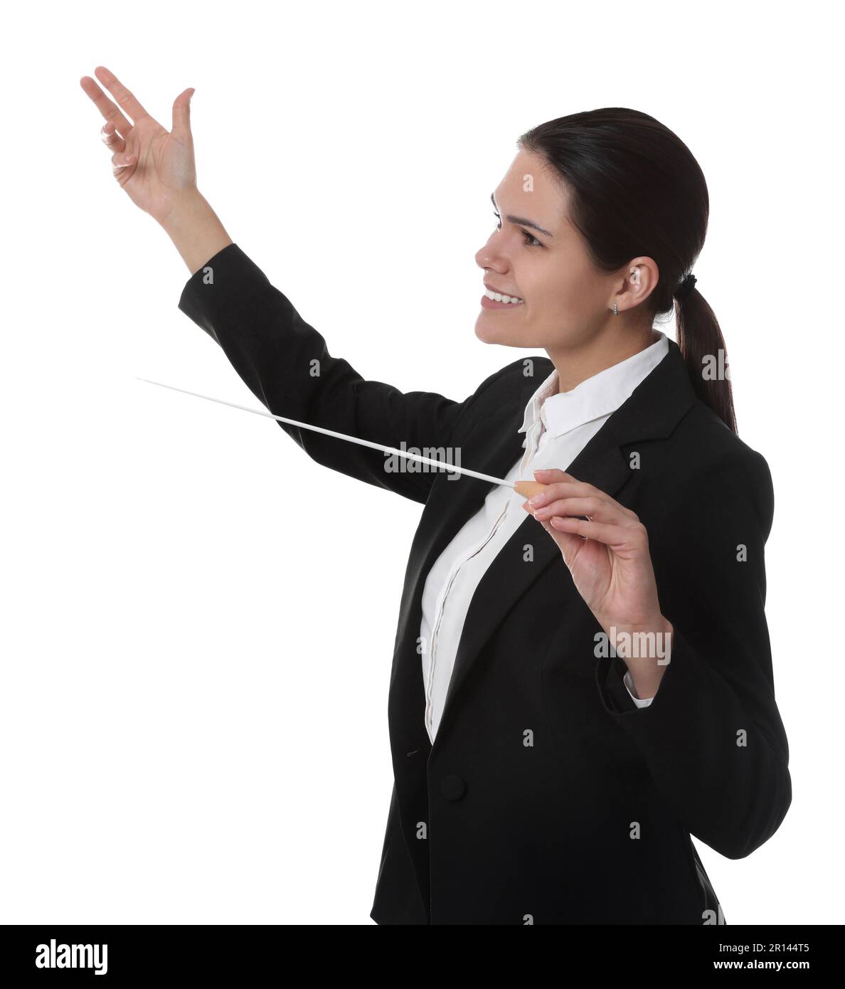 Happy young conductor with baton on white background Stock Photo - Alamy