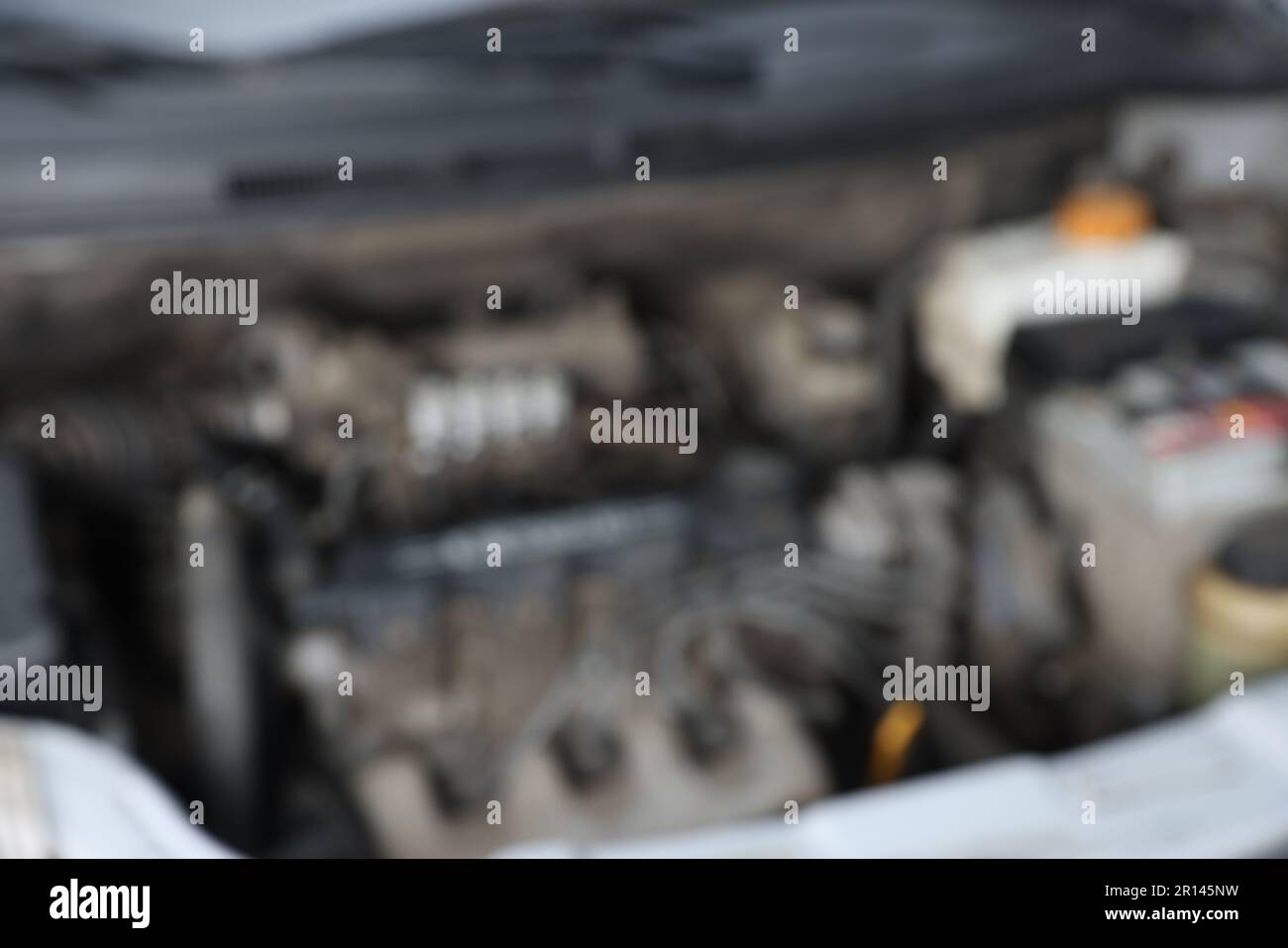 Blurred view of engine bay in modern car Stock Photo - Alamy