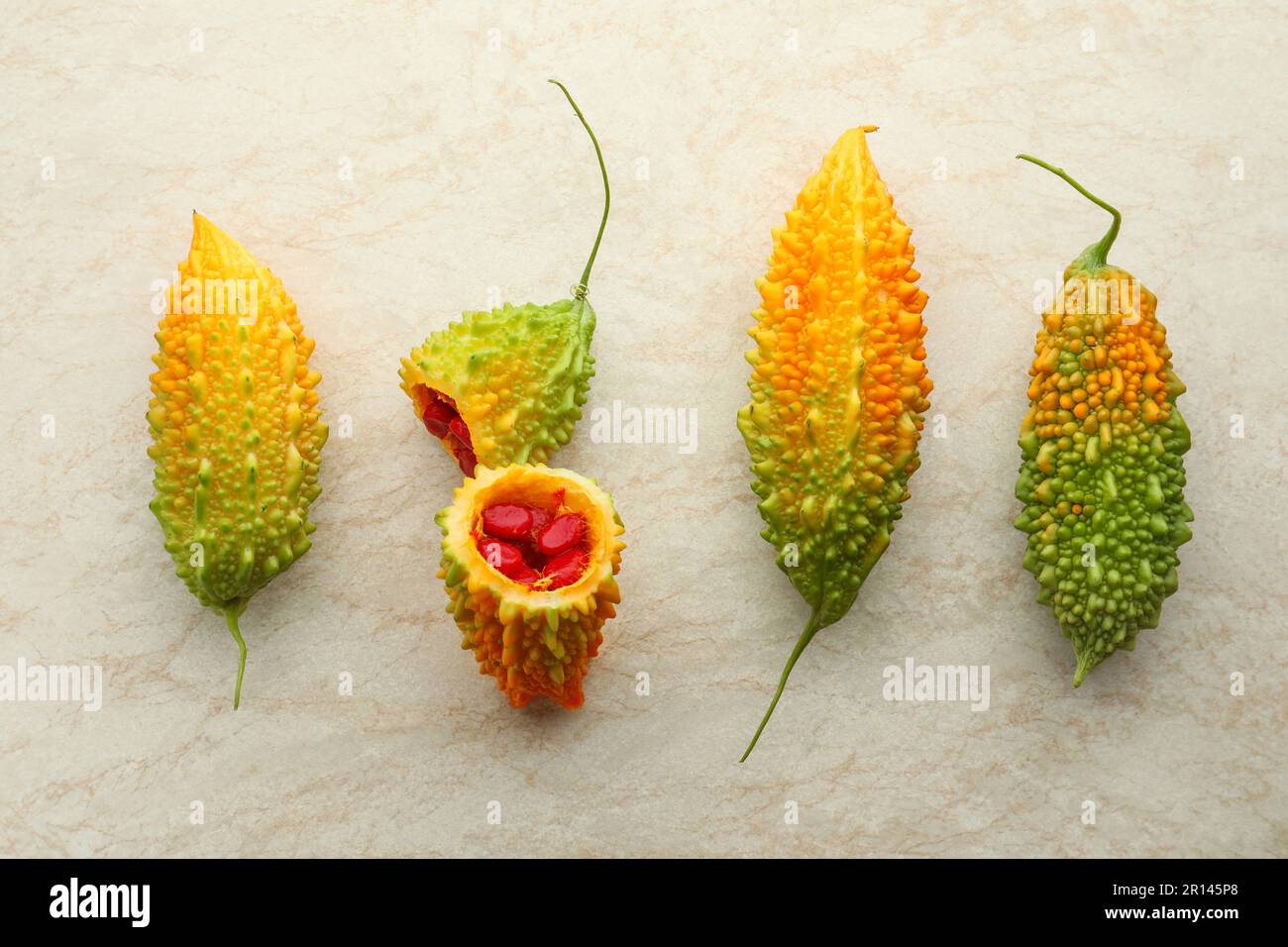Fresh bitter melons on light table, flat lay Stock Photo - Alamy