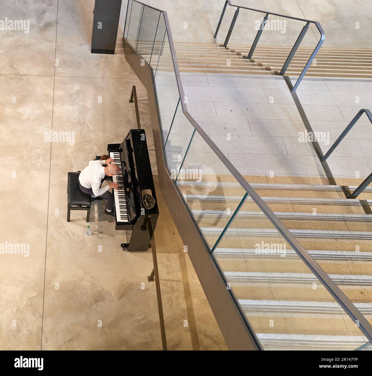 Piano played by a man in the shopping centre at the former power ...