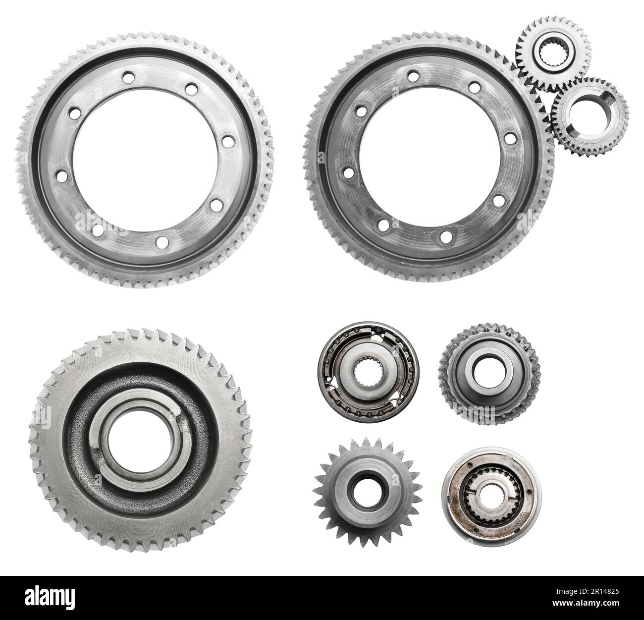 Set with different stainless steel gears on white background, top view ...