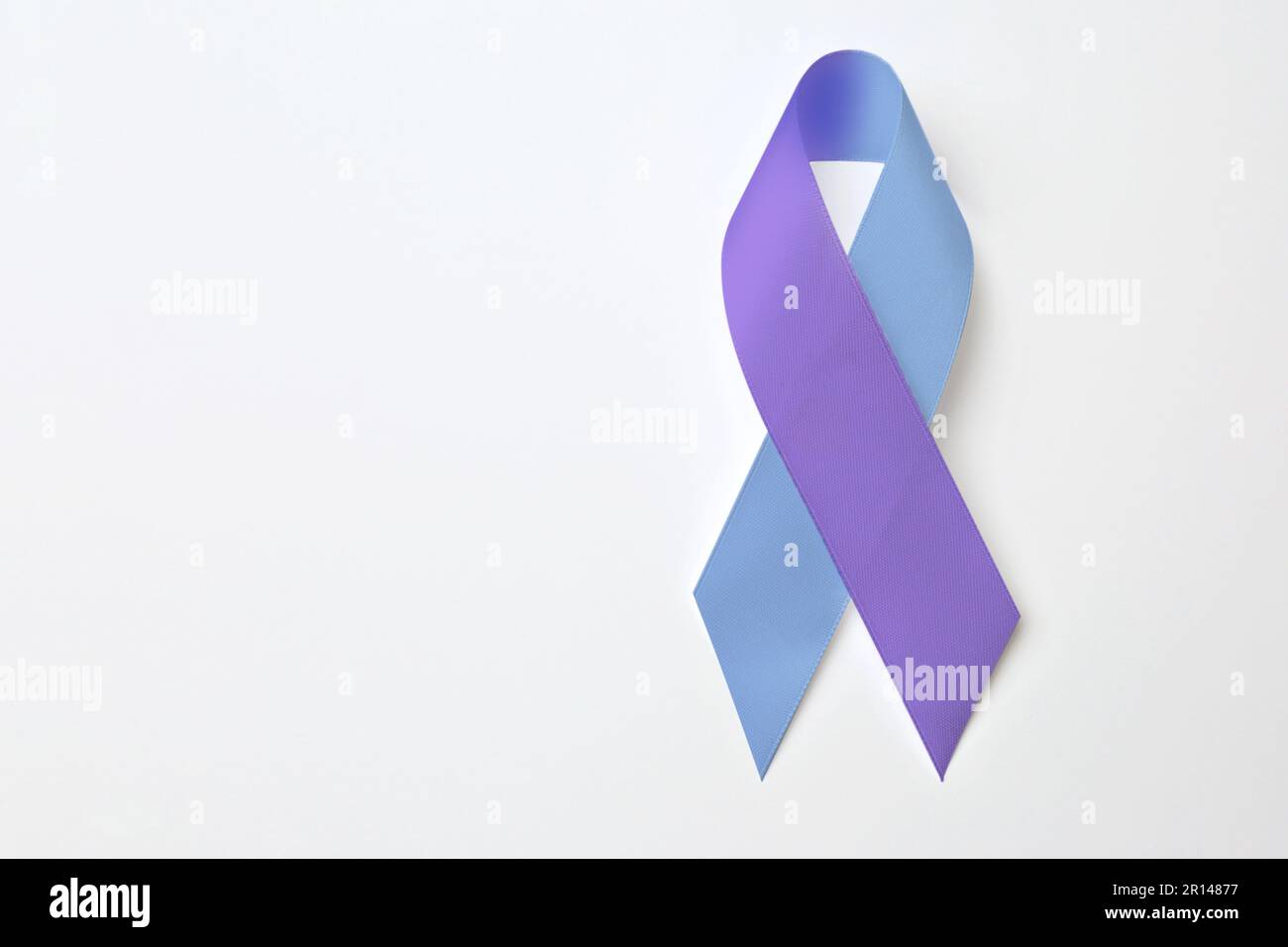 World Arthritis Day. Blue and purple awareness ribbon on white ...
