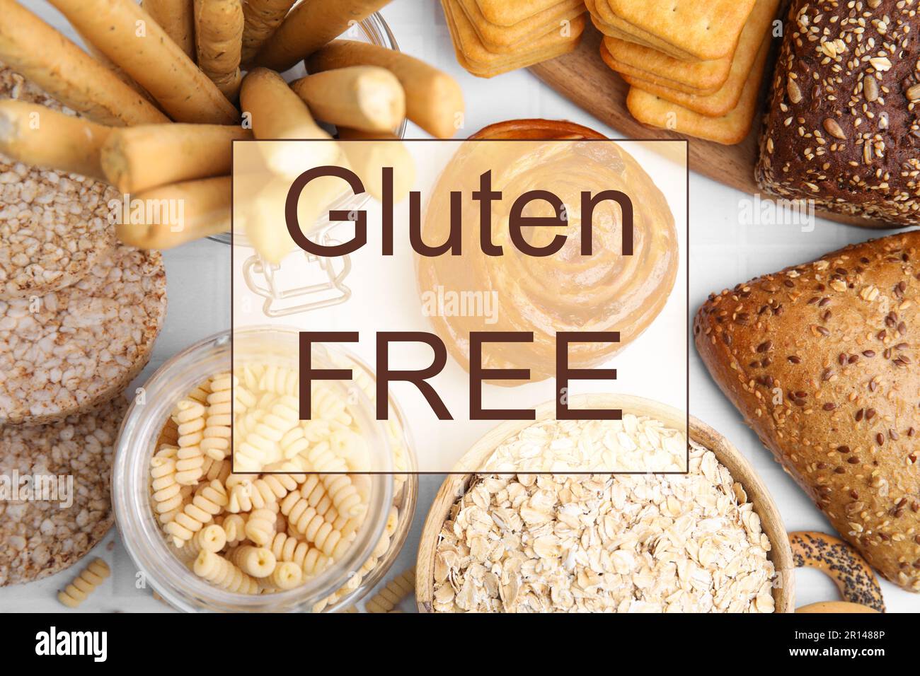 Different gluten free products on white tiled table, flat lay Stock ...