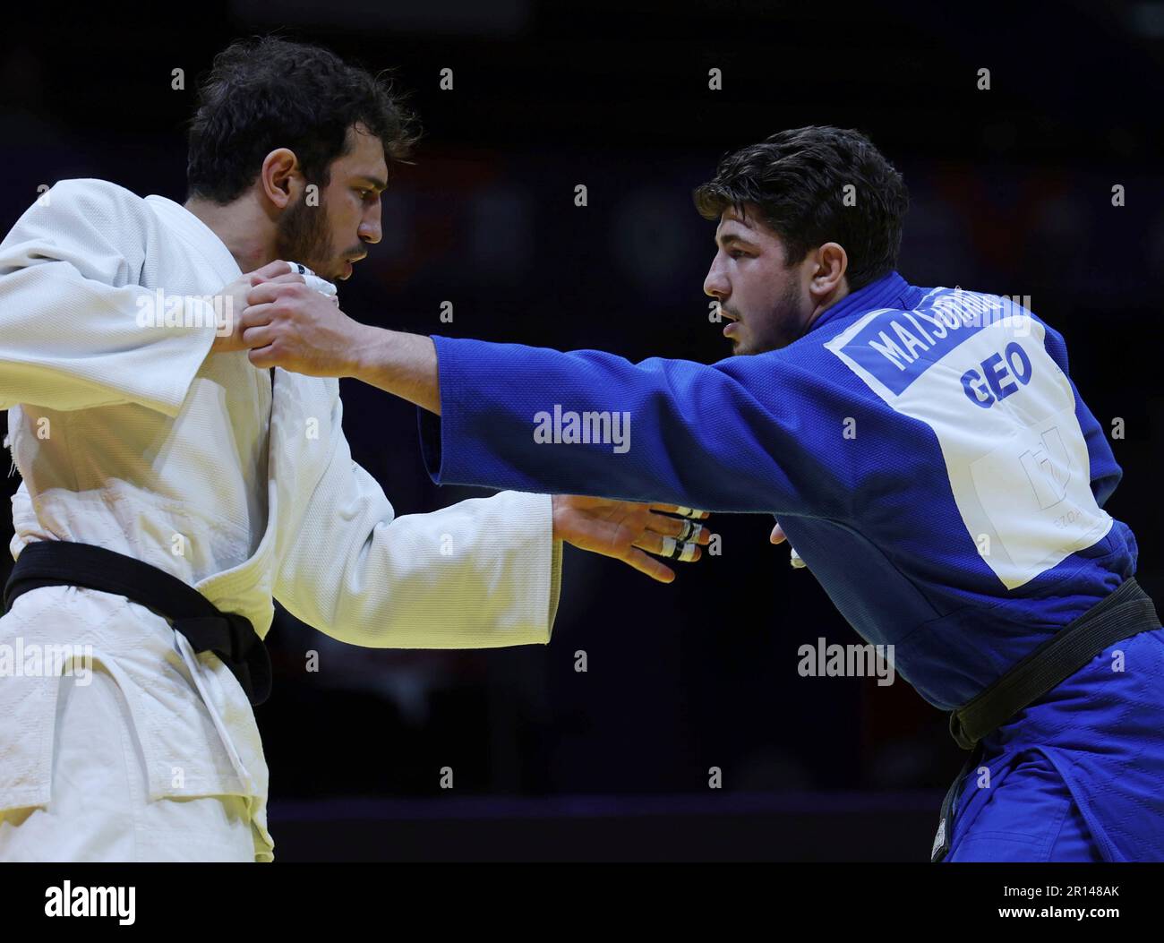 Georgia's Lasha BEKAURI (white) and Luka MAISURADZE (blue) compete ...