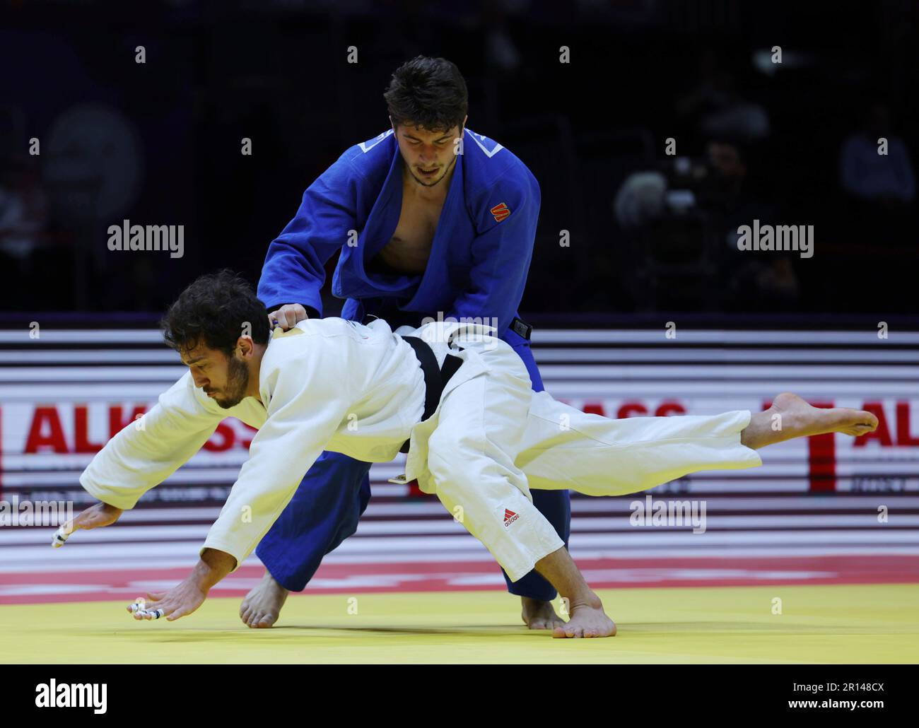 Georgia's Lasha BEKAURI (white) and Luka MAISURADZE (blue) compete ...