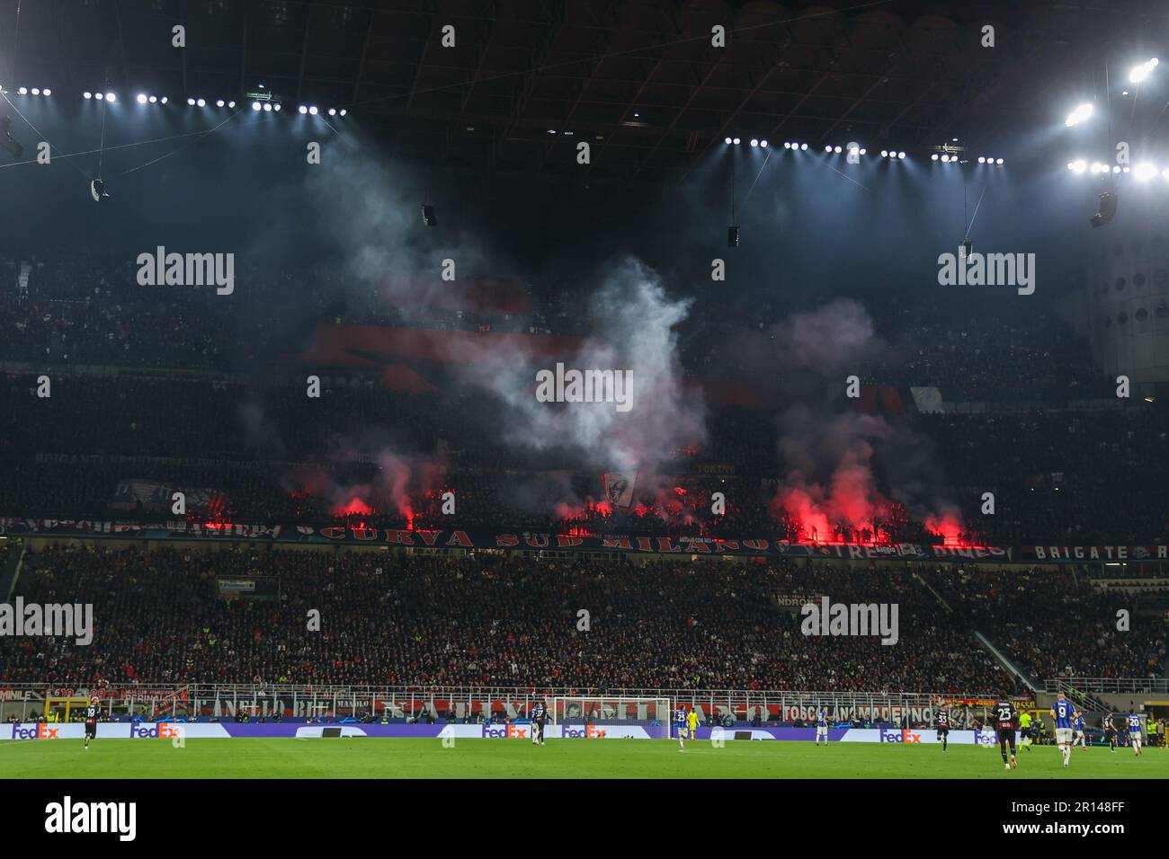 AC Milan supporters use smoke flares during UEFA Champions League 2022/ ...