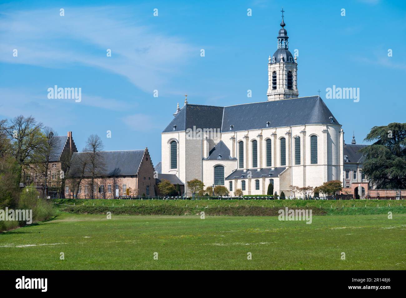 Averbode, Laakdal, Belgium - April 21, 2023 - The white abbey church in ...