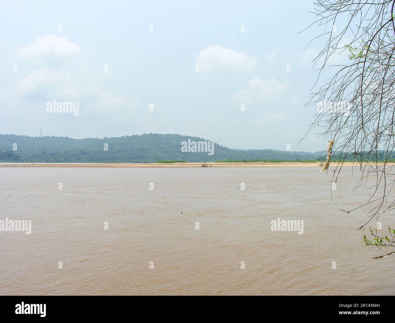 Flooded river with muddy rain water Stock Photo - Alamy