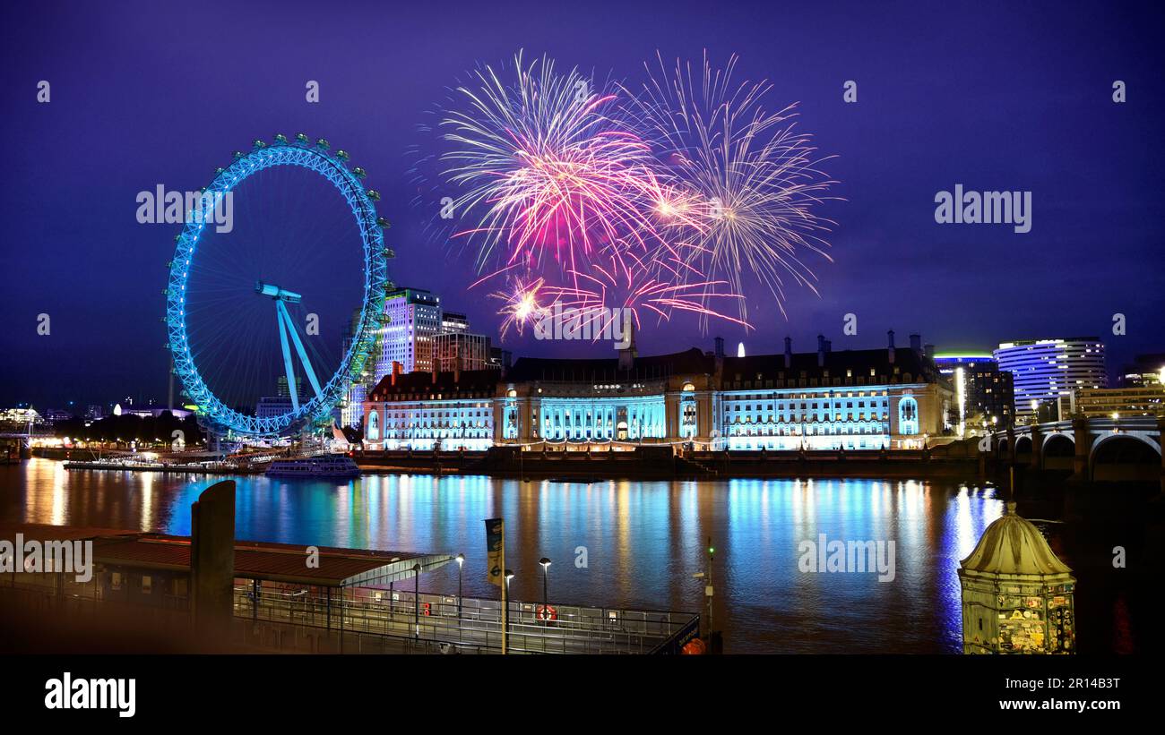 Fireworks sparkling in London sky next to river Thames and famous ...