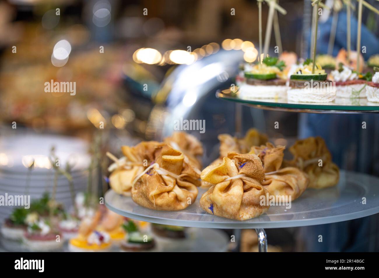 pancake bag with filling on the buffet table with snacks Stock Photo ...