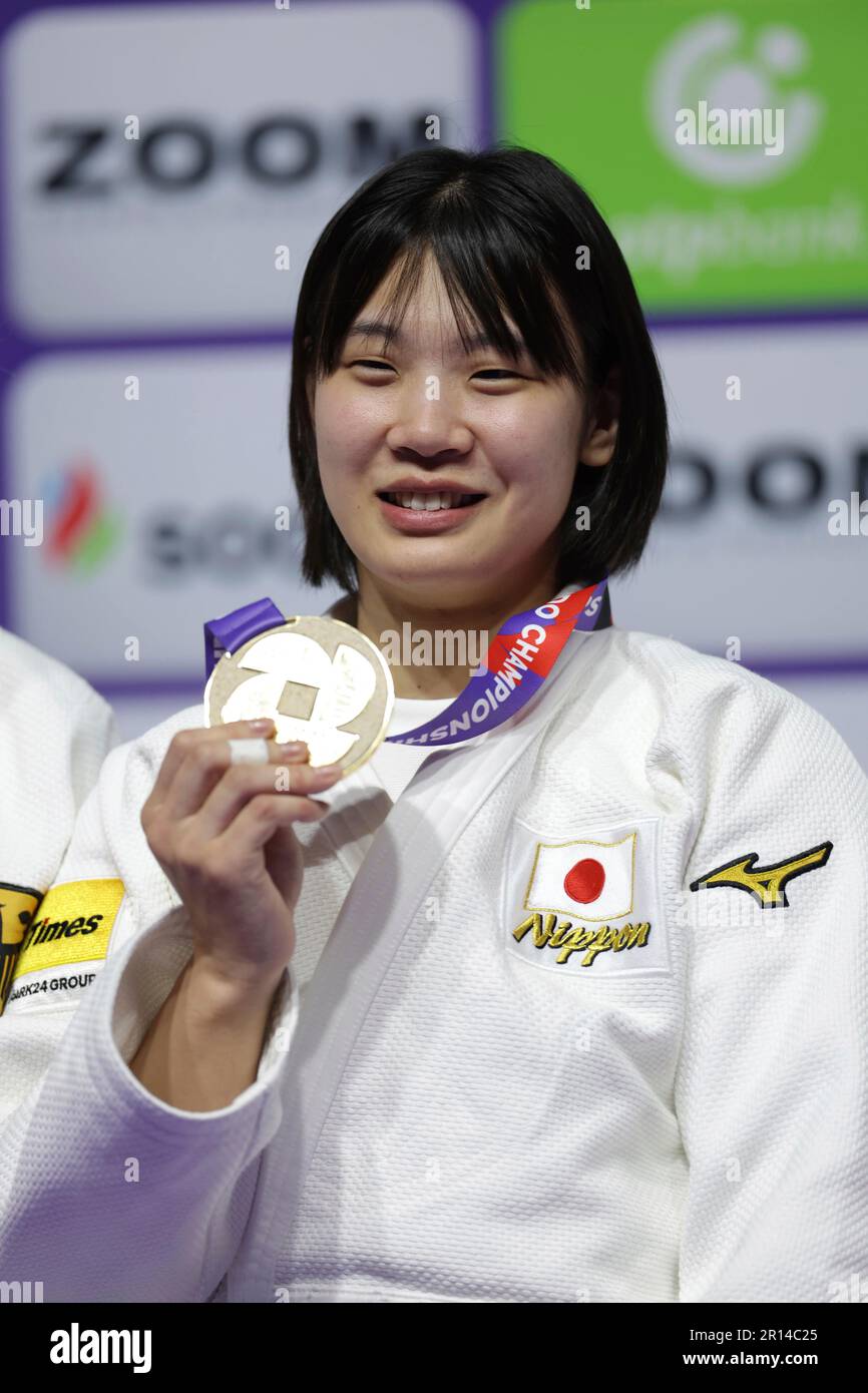 Japan's Saki NIIZOE, the winner, celebrates during an award ceremony of ...