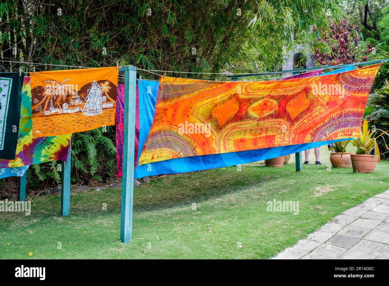 Caribelle Batik drying on a clothesline in St Kitts, West Indes Stock ...
